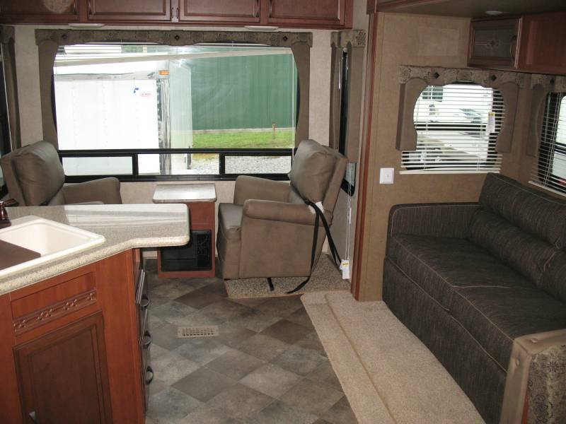 NEW 2015 PALOMINO PUMA 26RLSS - Overview | Berryland Campers