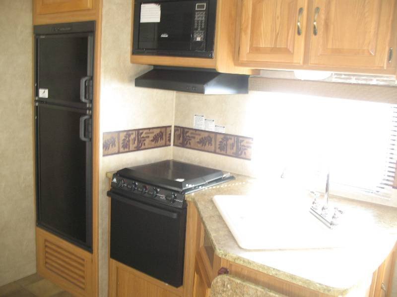 USED 2010 KEYSTONE SPRINGDALE 242 - Overview | Berryland Campers